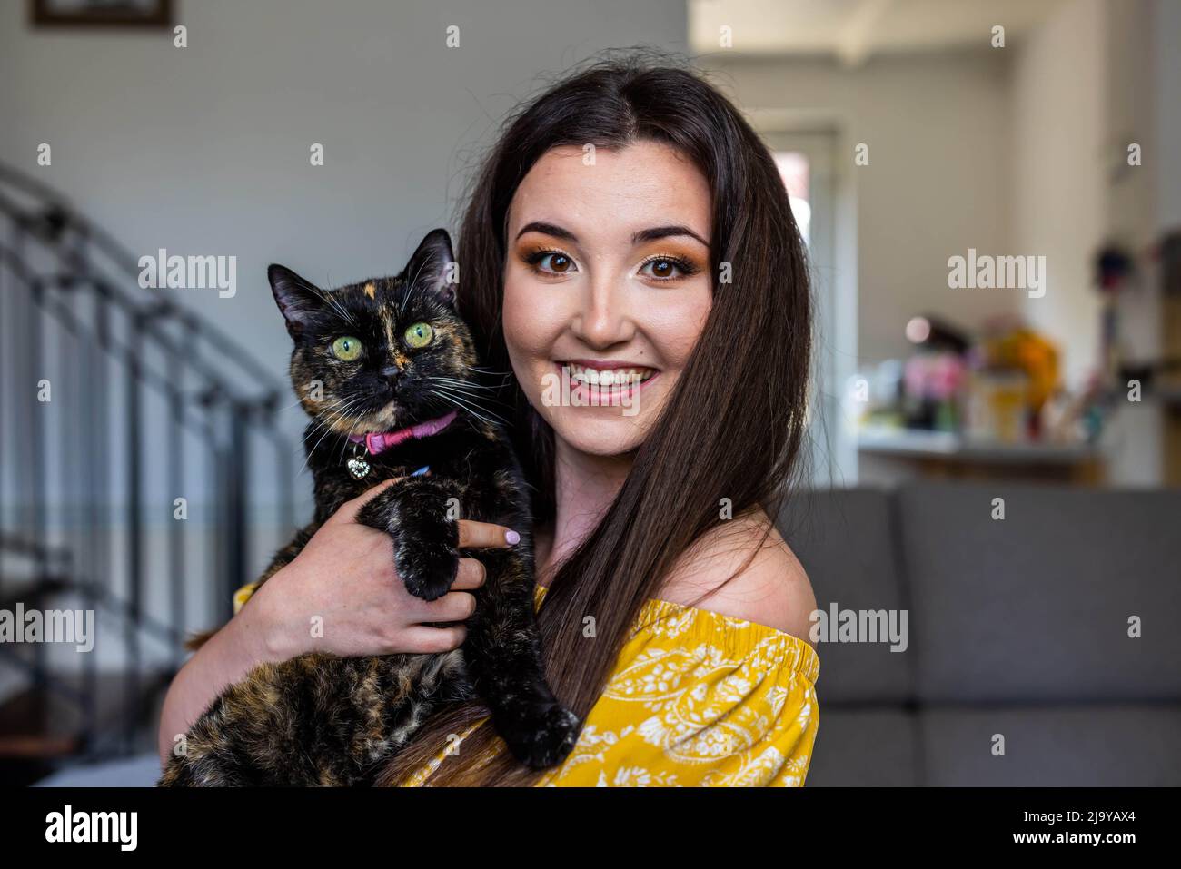 EDITORIAL USE ONLY Coral Jones from Poole with her pet cat Misty, who ...