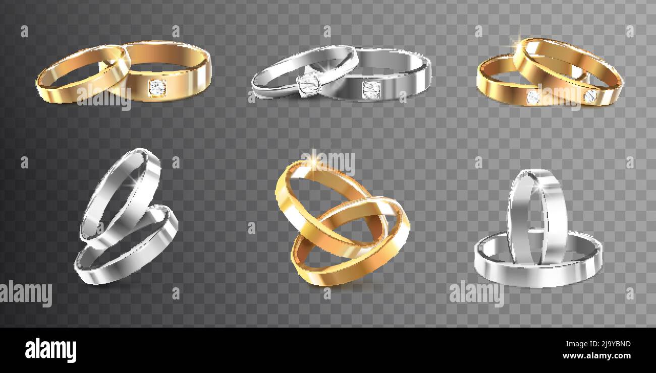 Golden and silver wedding rings decorated with precious stones on ...