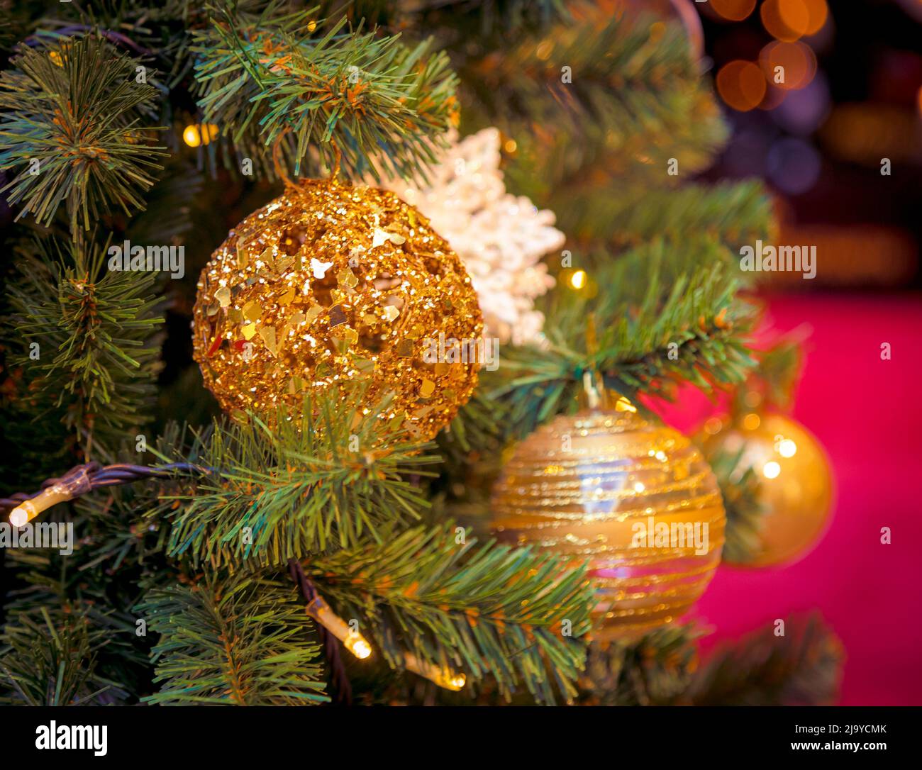 Christmas decorations on the branches of fir tree Stock Photo - Alamy