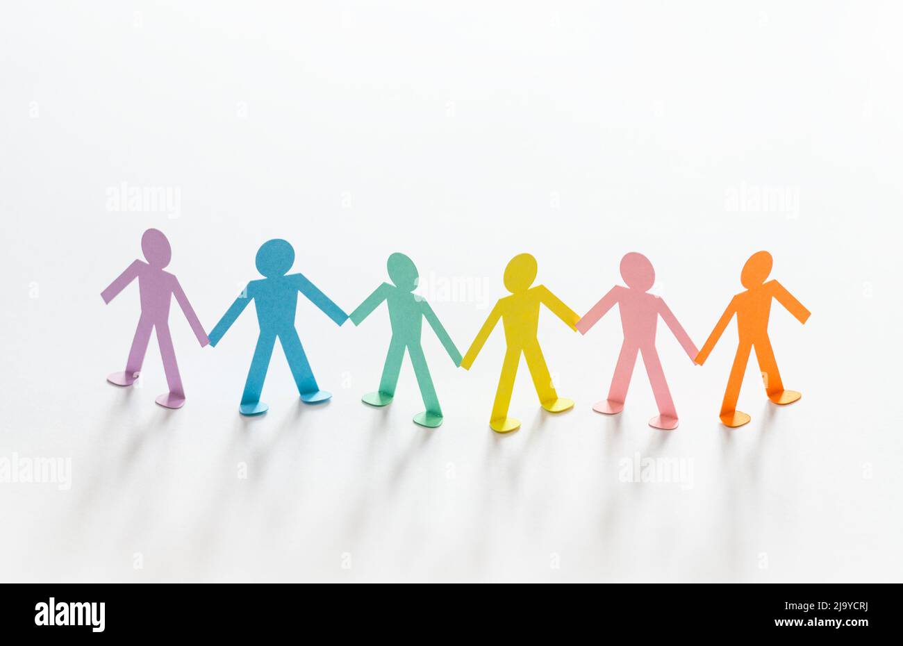 paper people chain concept of social help and togetherness in group ...