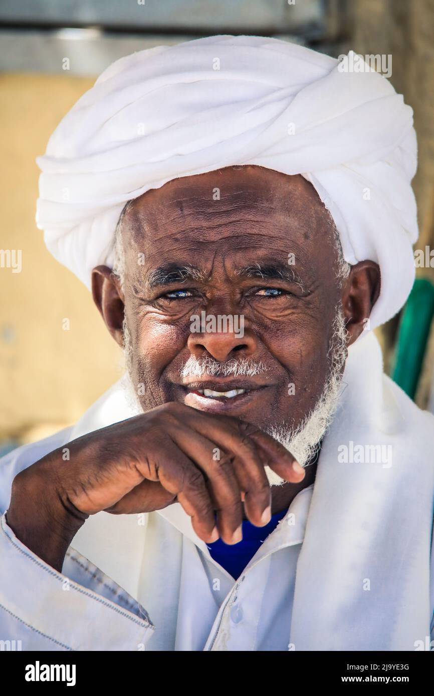 Local Eritrean Man in Traditional White dress on the Keren Camel animal ...