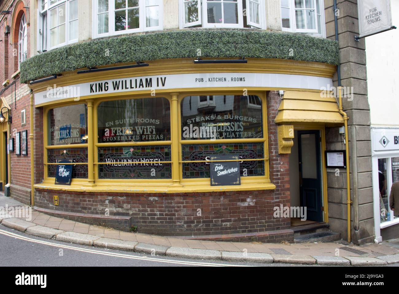 TOTNES, UK - JUNE 26, 2021 the King William IV pub on Fore Street on a ...