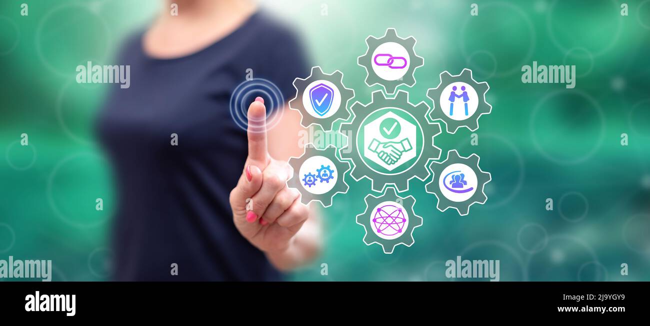 Woman touching a trust concept on a touch screen with her finger Stock ...