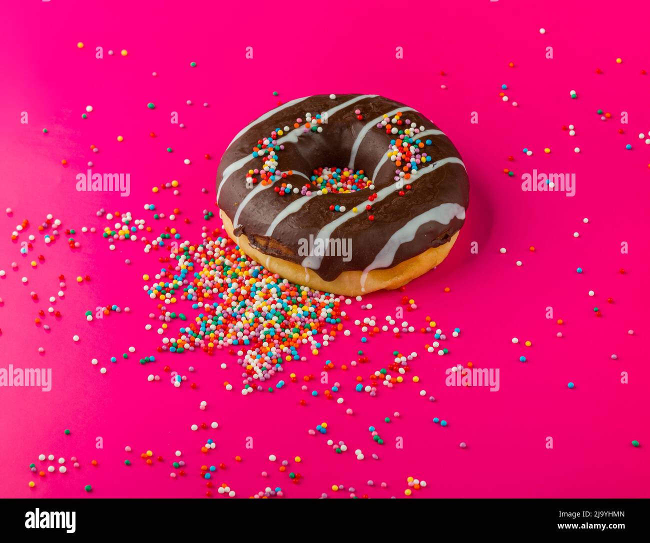 Donuts on a color background Stock Photo - Alamy
