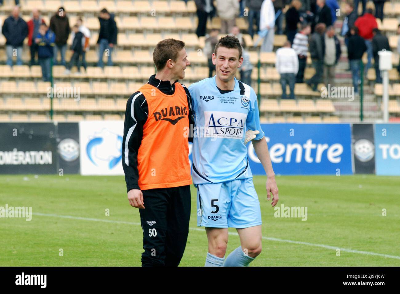Tours goalkeeper Romain Salin (left) with Laurent Koscielny Stock Photo ...