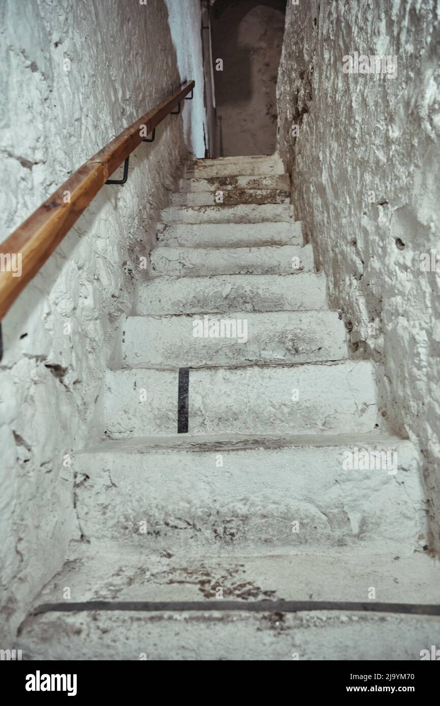 narrow white stone stairs in a castle Stock Photo - Alamy