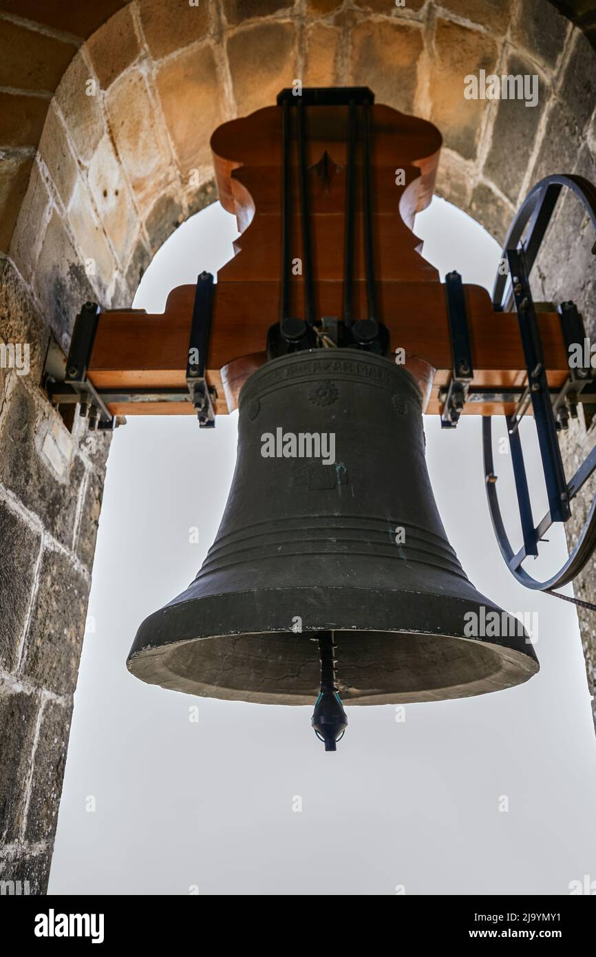 Image of one of the bells in the bell tower of the church Stock Photo ...