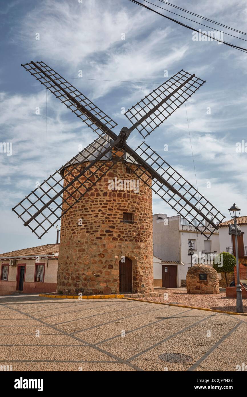 old brown windmill in the middle of the village square Stock Photo - Alamy
