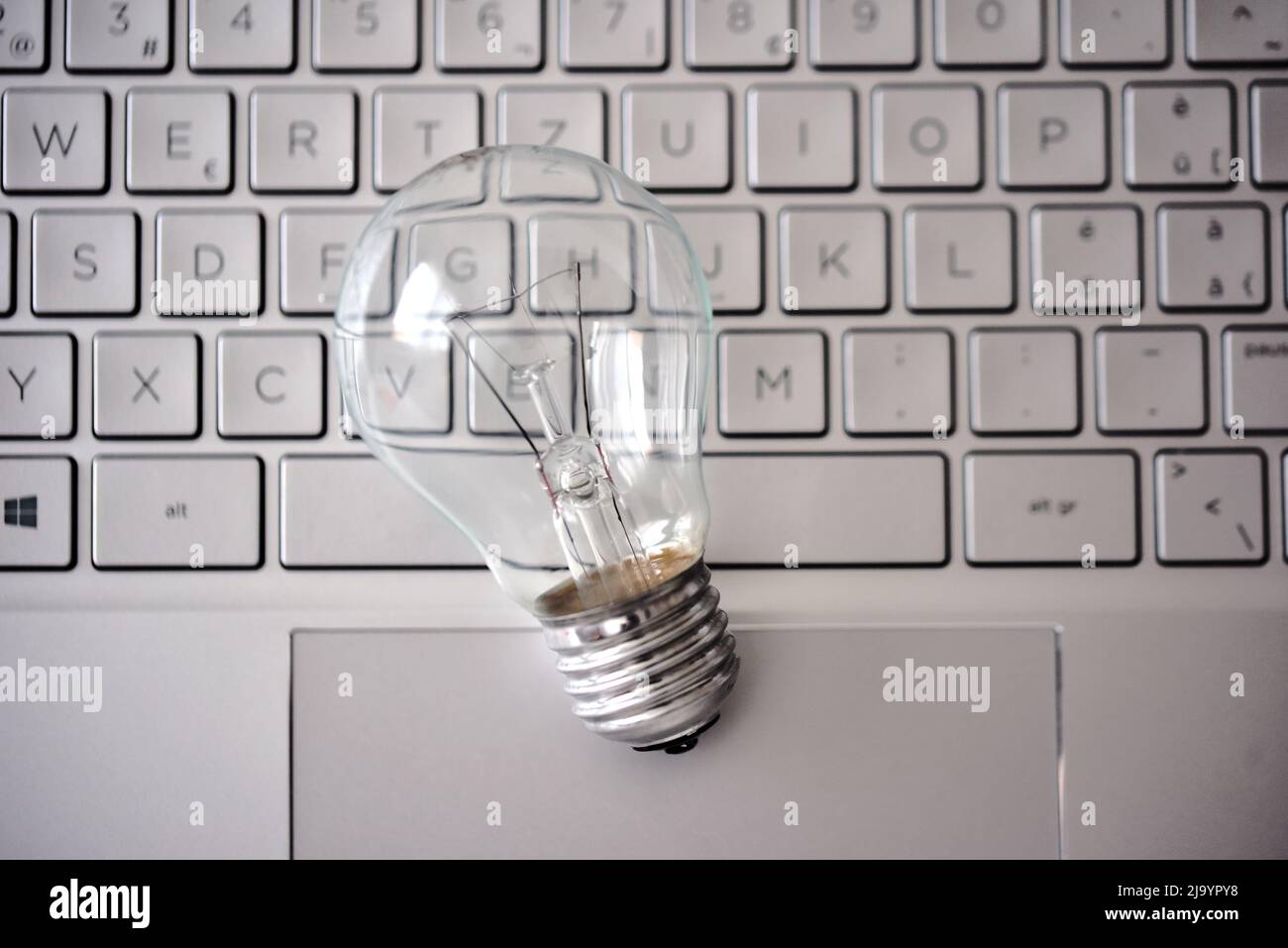 light bulb with pc keyboard Stock Photo - Alamy