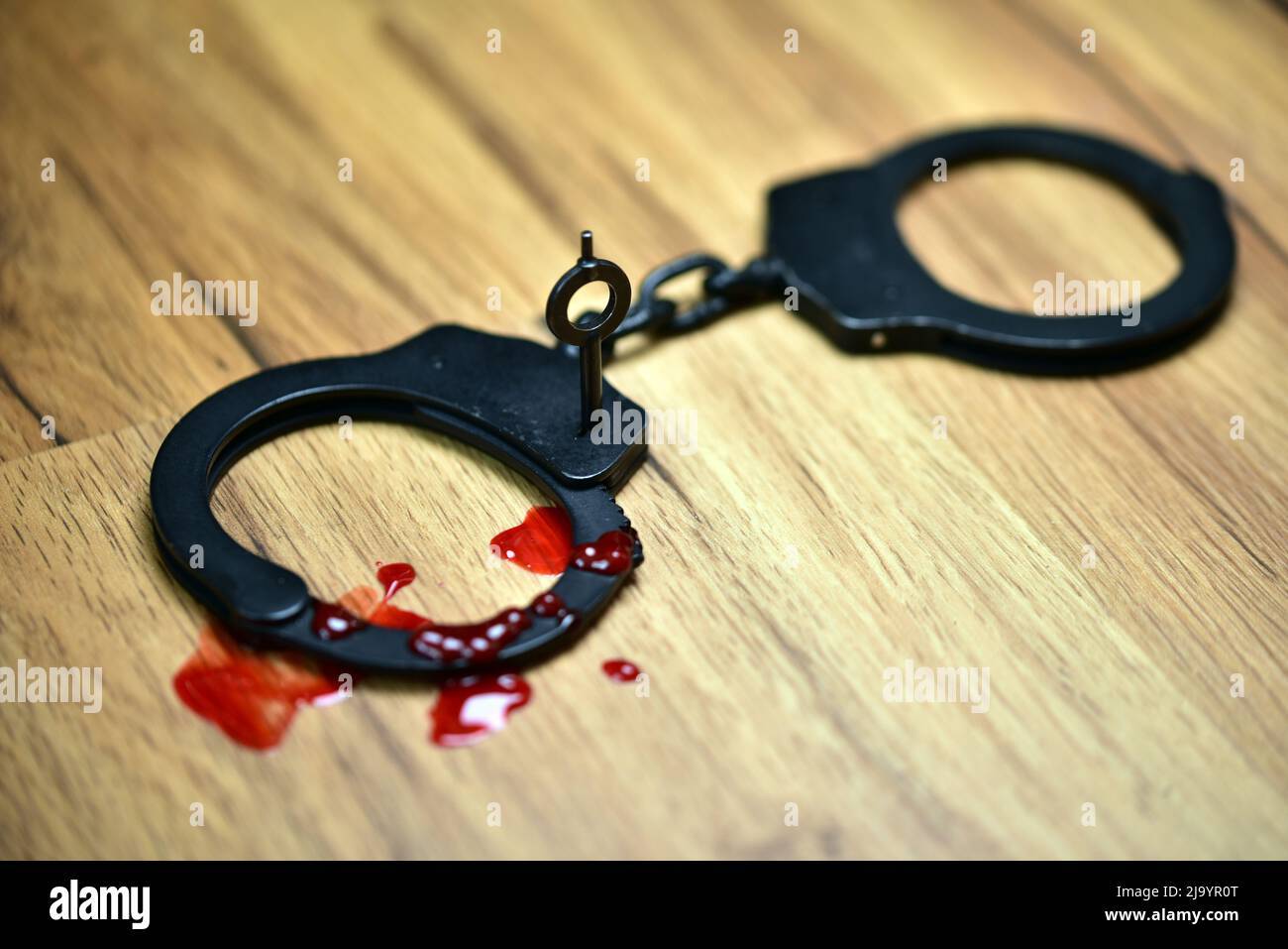 Jail cuffs hi-res stock photography and images - Alamy