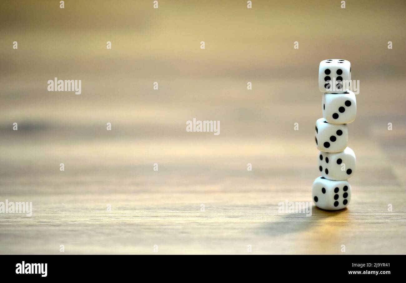Wooden red and black dice hi-res stock photography and images - Alamy