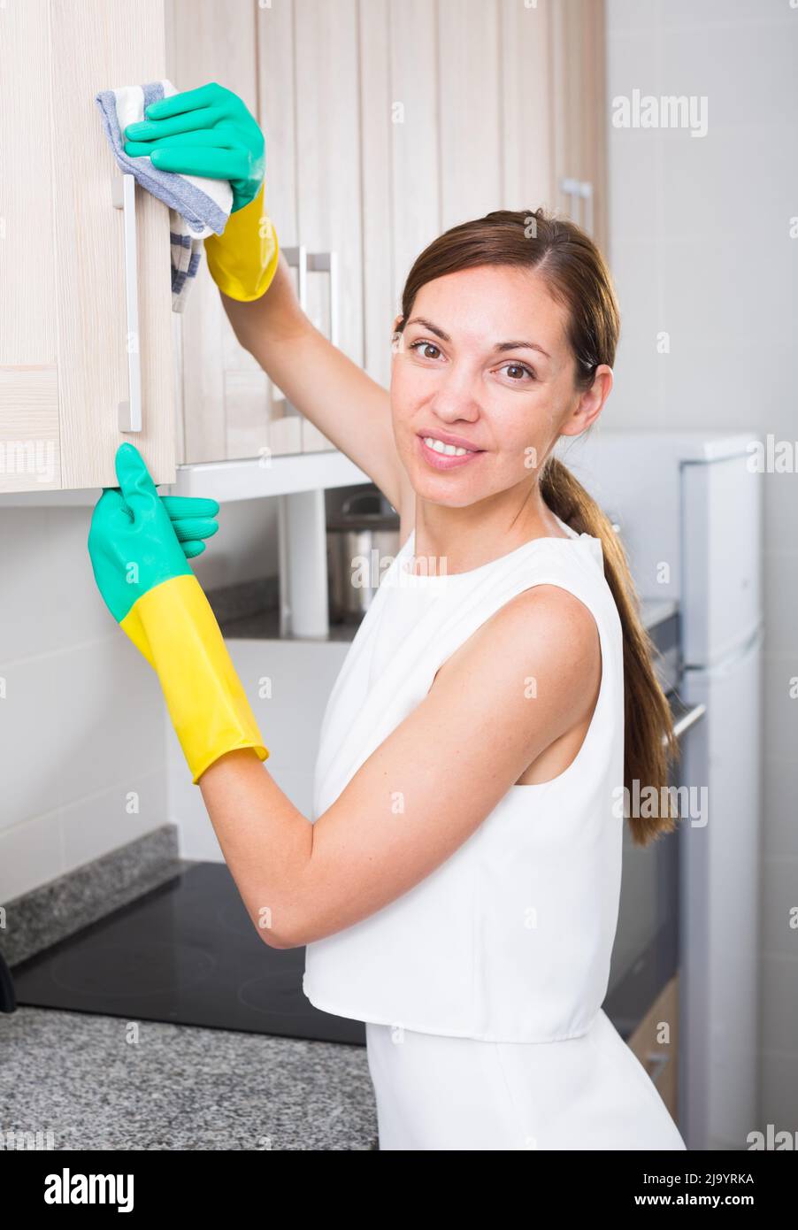 Working cleaning holding sweeping hi-res stock photography and images ...