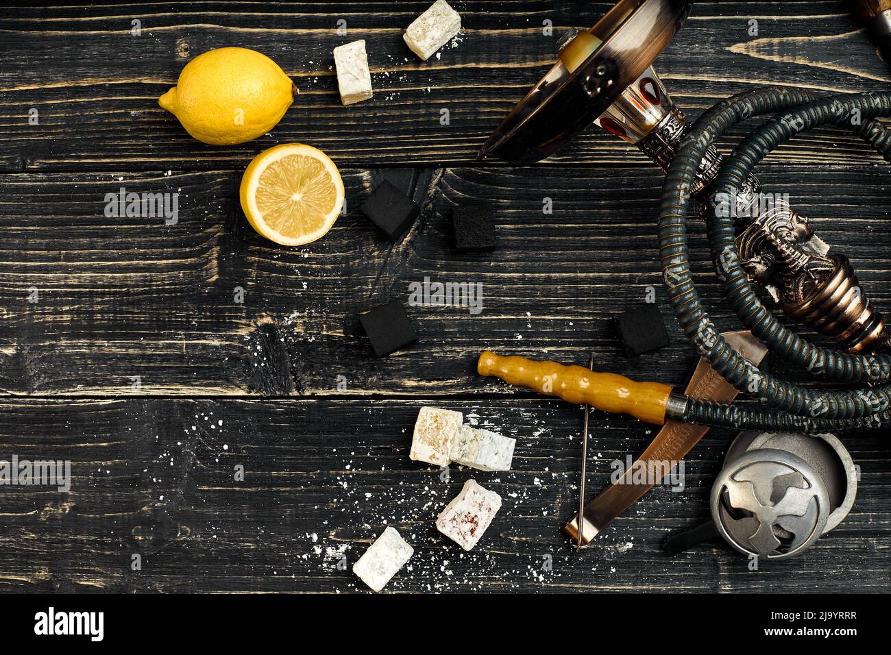 Arabic hookah with a tobacco flavor of a mixture of lemon. Top view of ...