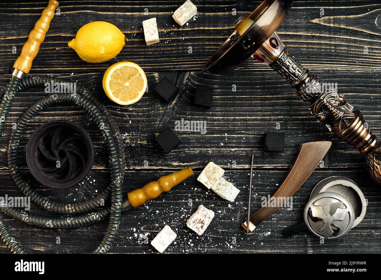 Arabic hookah with a tobacco flavor of a mixture of lemon. Top view of ...