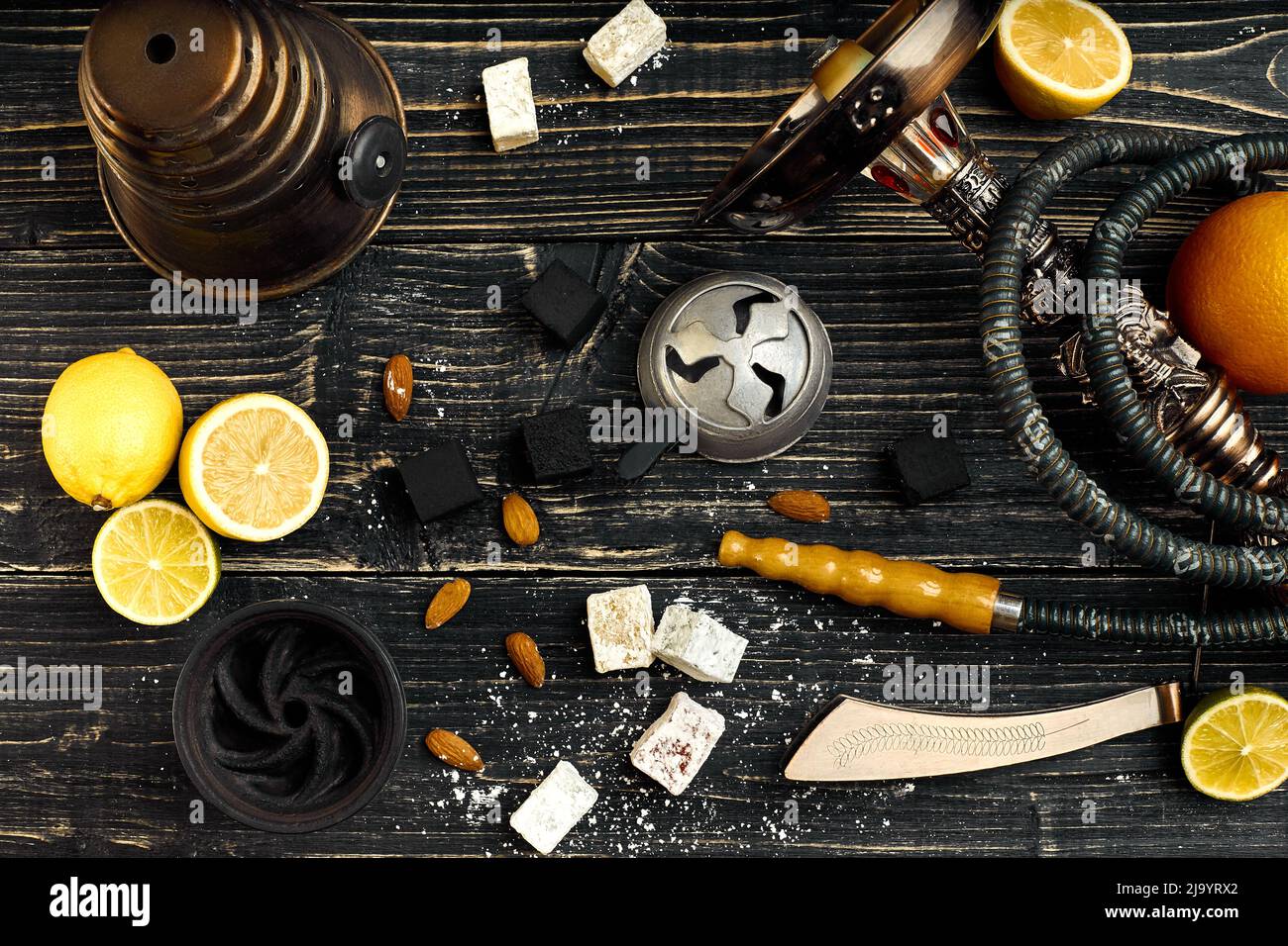 Arabic hookah with a tobacco flavor of a mixture of lemon. Top view of ...