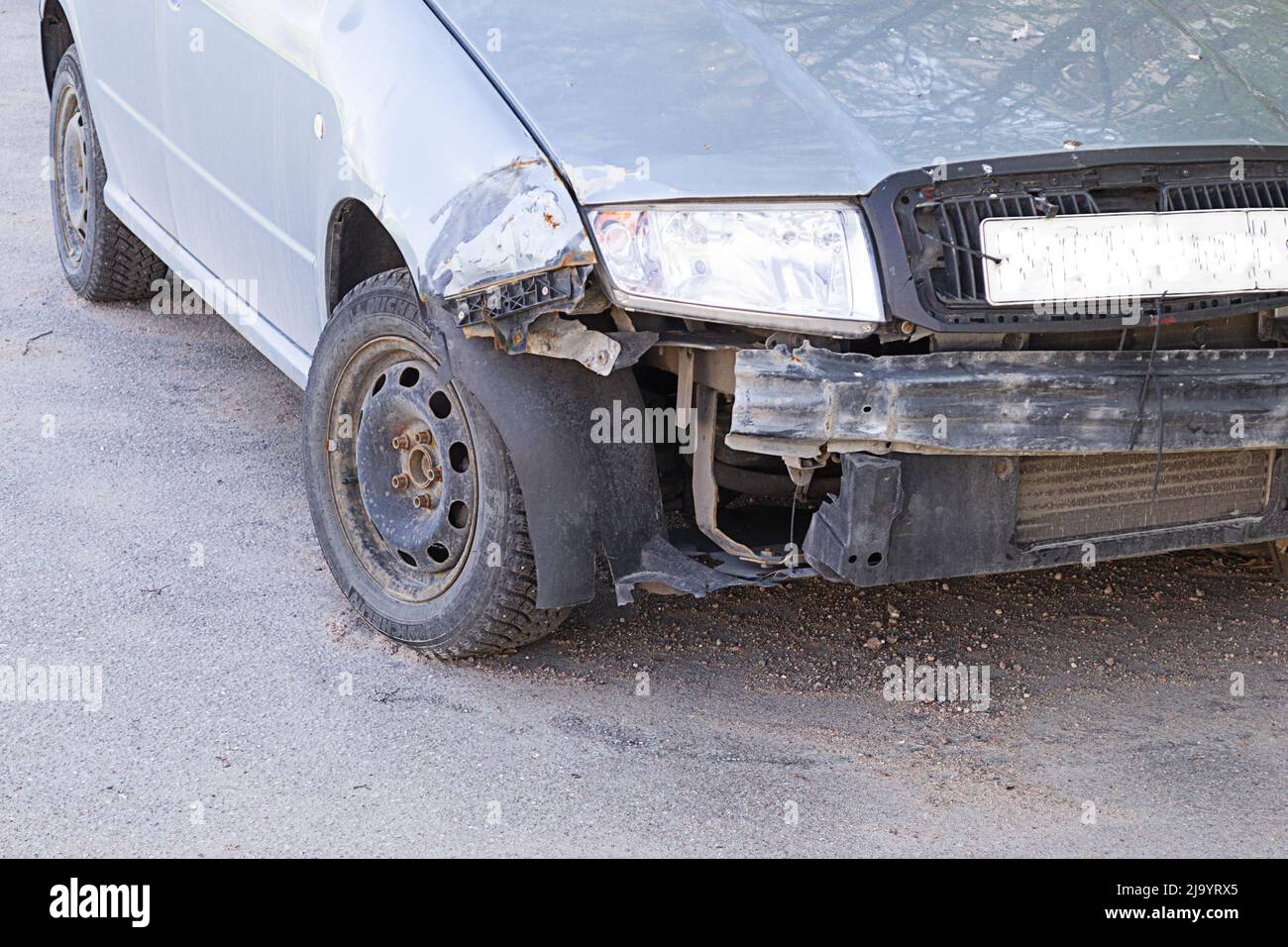 small damage to the front of the car as a result of a road accident ...