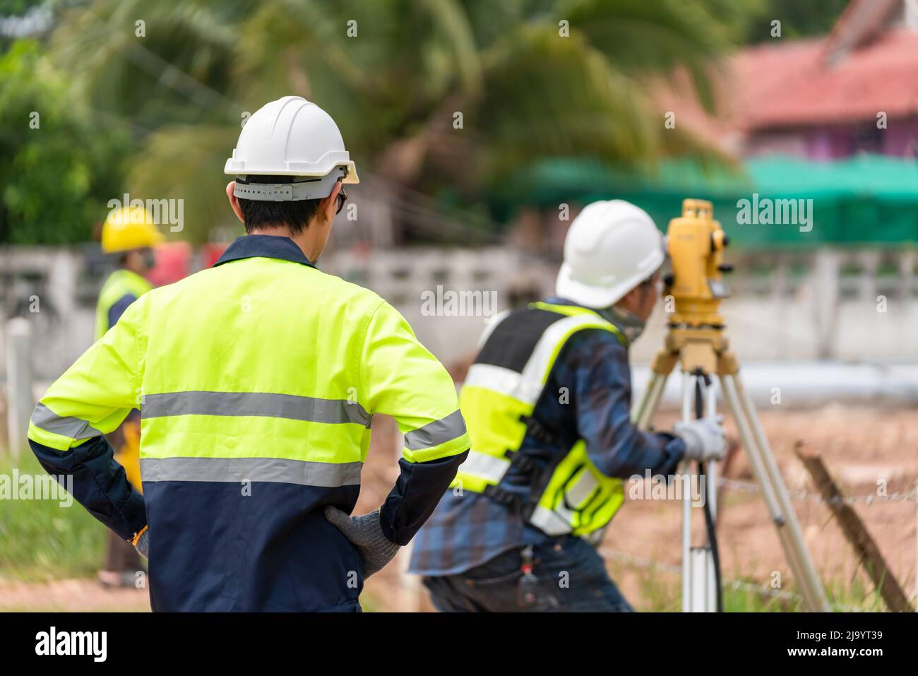 Surveyor Civil Engineer with equipment on the construction site Stock ...