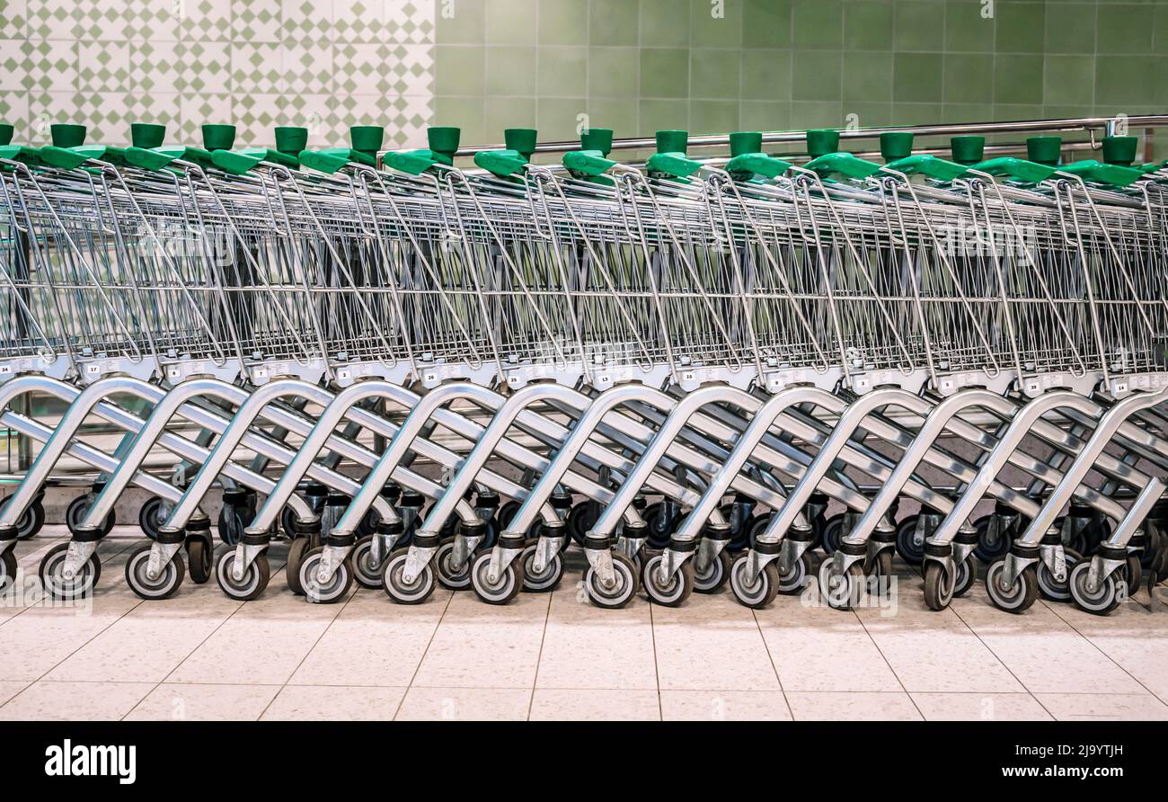 Supermarket carts. Grocery trolley in store. High quality photo Stock ...
