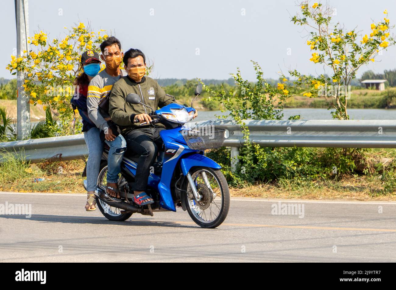 Three people on a motorcycle hi-res stock photography and images - Alamy