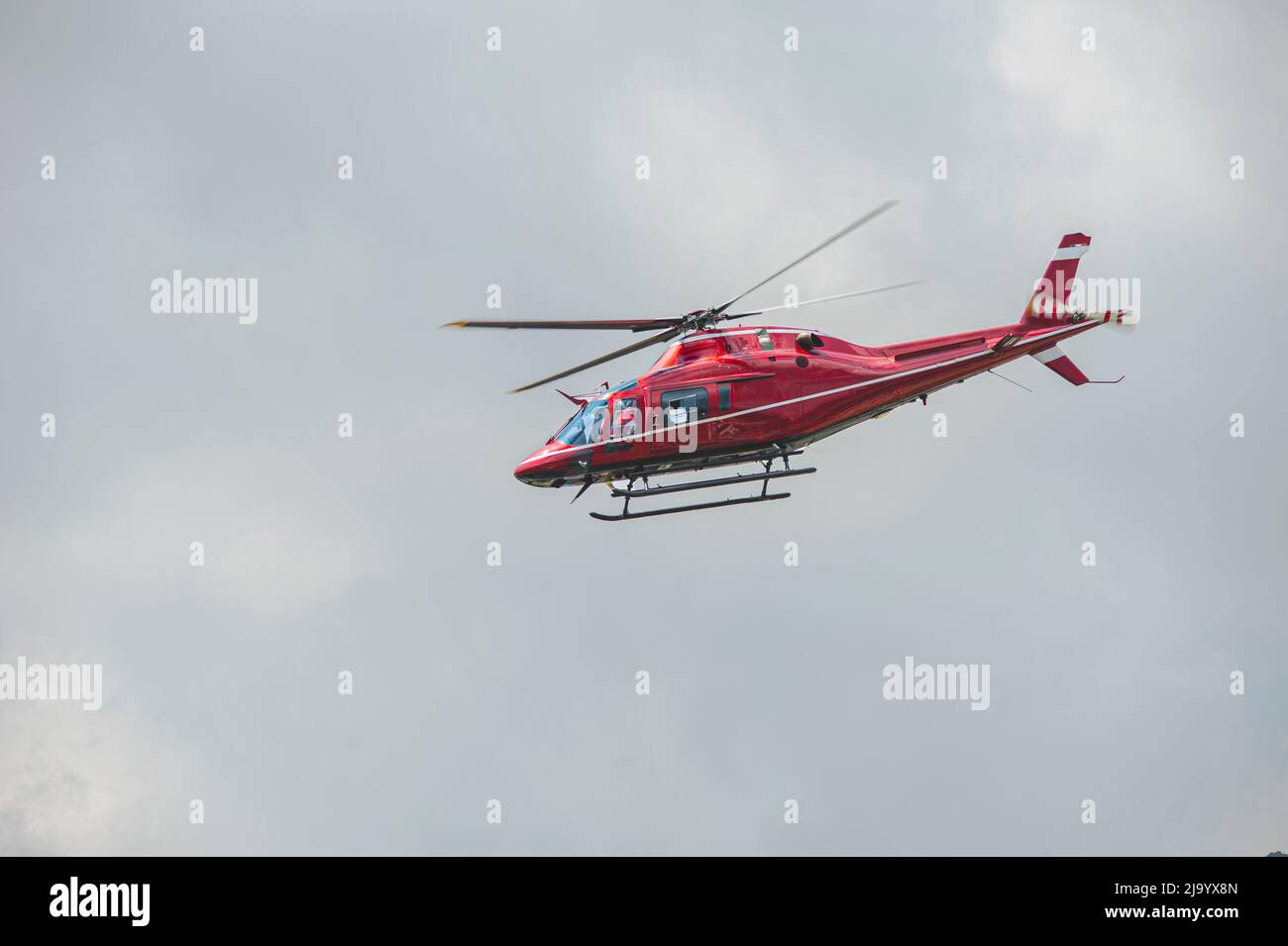 Helicopter in flight sunset hi-res stock photography and images - Alamy
