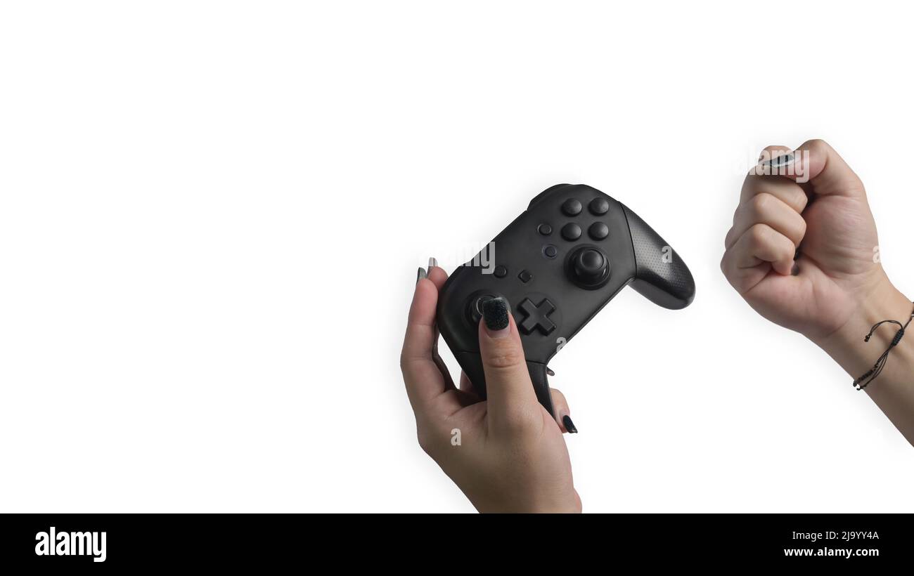 Woman hand holding video game console controller isolated on white ...