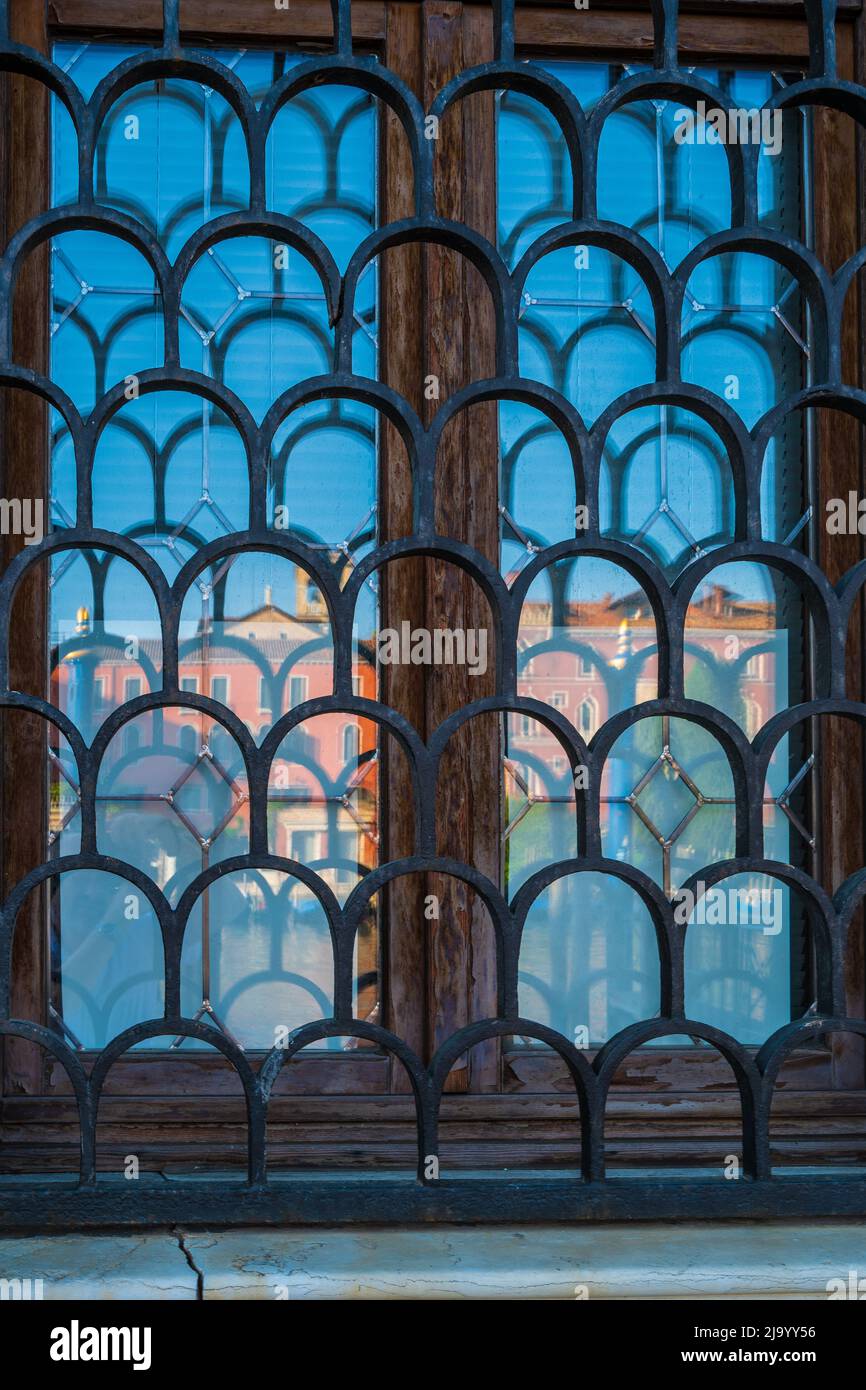 Arched metalwork window bars, Venice, Italy Stock Photo - Alamy