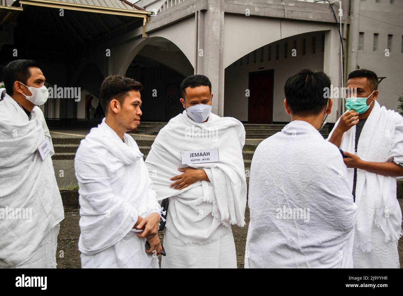 Indonesian Muslims prepare before simulating the circumambulation of a ...