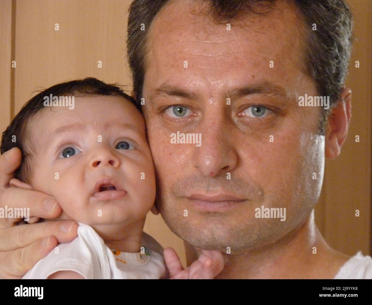 newborn baby and his excited, puzzled father Stock Photo - Alamy