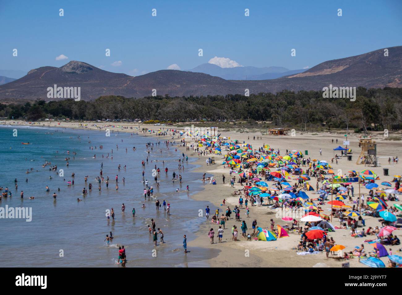 People crowding the beach during summer at Pichidangui, Chile Stock ...