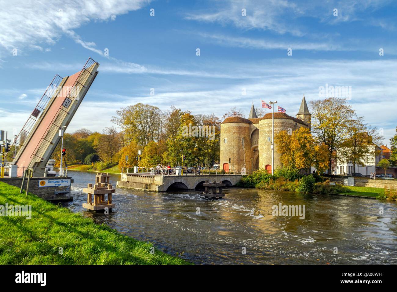 Bruges, Belgium - November 12, 2021: - The Gentpoort or Ghent Gate, a ...