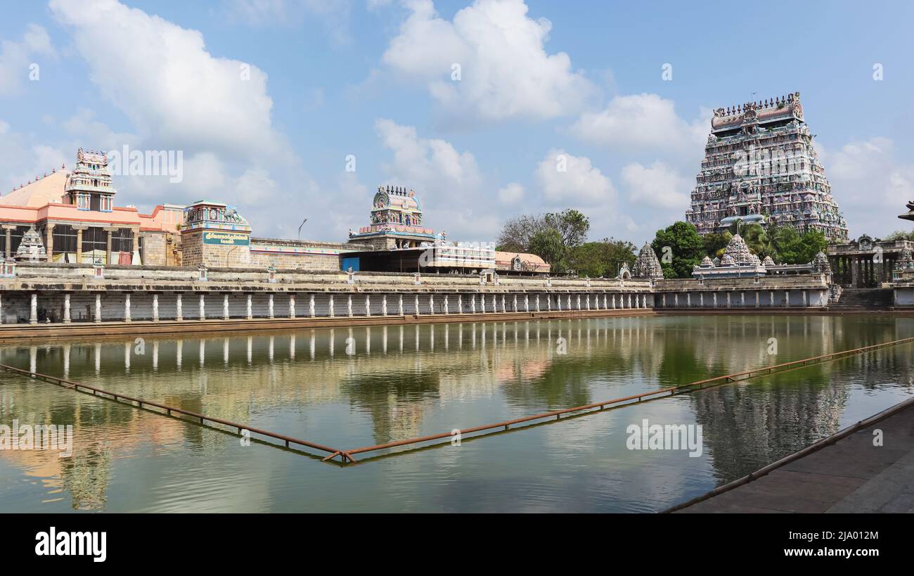 View of Gopuram of Nataraja Temple and Shivgangai Teertham water tank ...