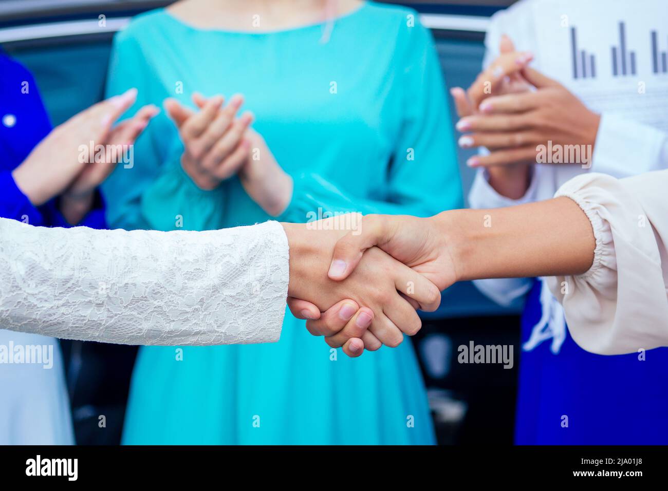 group of five caucasian Muslim office lady discussing with a ...