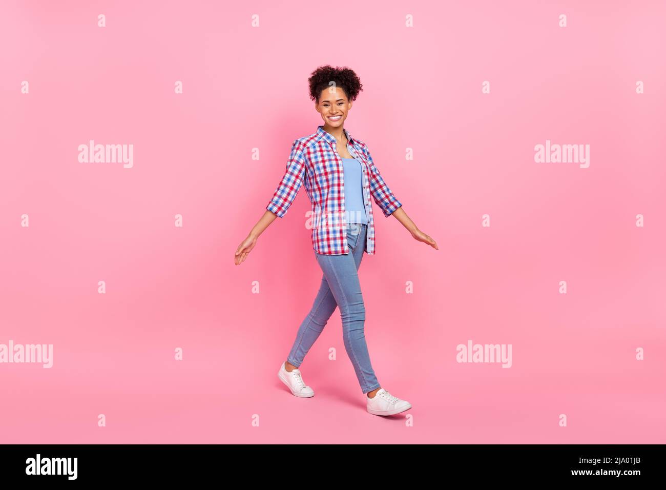 Full length body size view of attractive cheerful wavy-haired girl ...