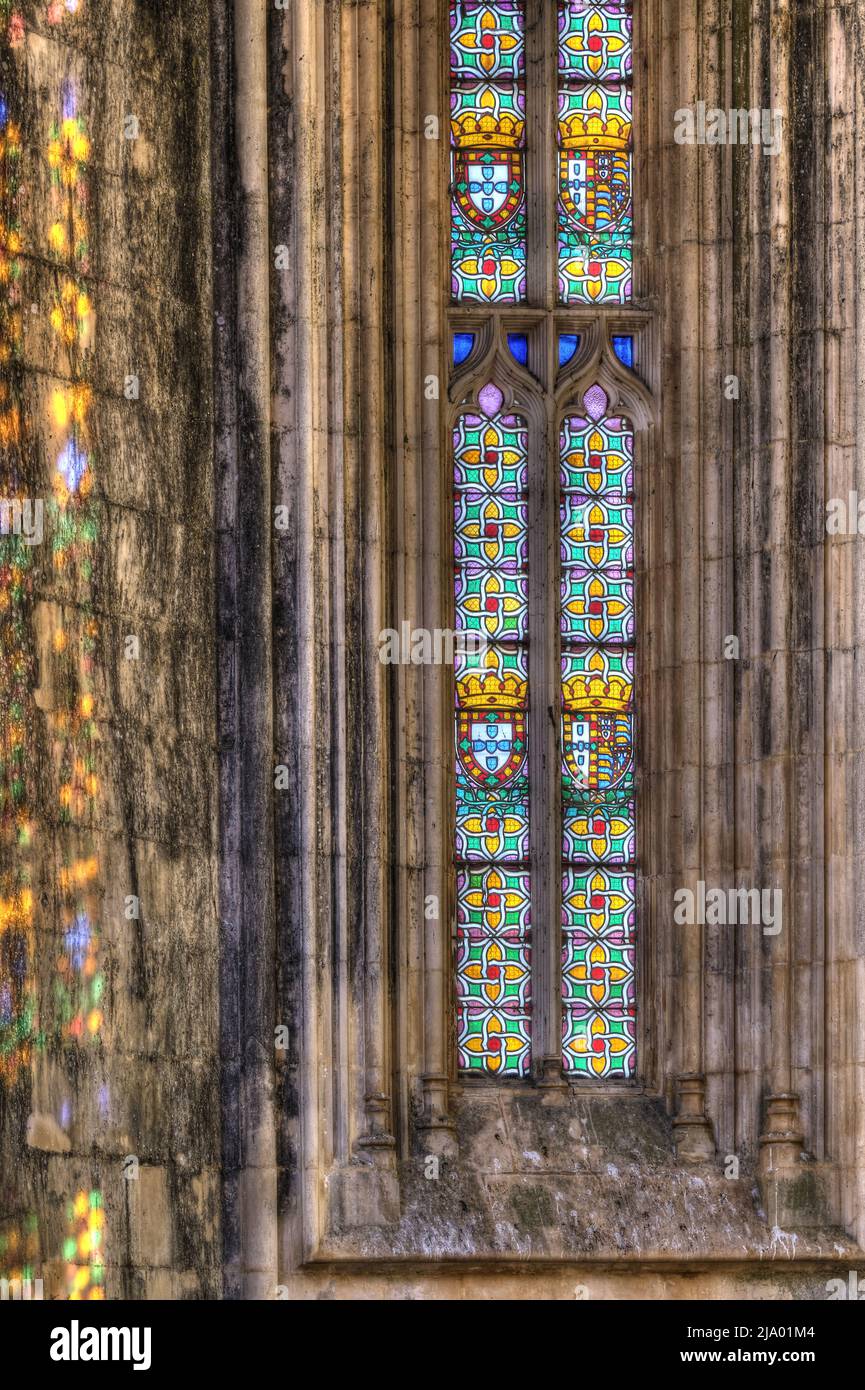 stained glass windows and pillars in Interior of the Unfinished chapels ...