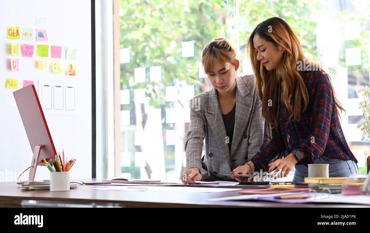 Young female web developer hi-res stock photography and images - Alamy