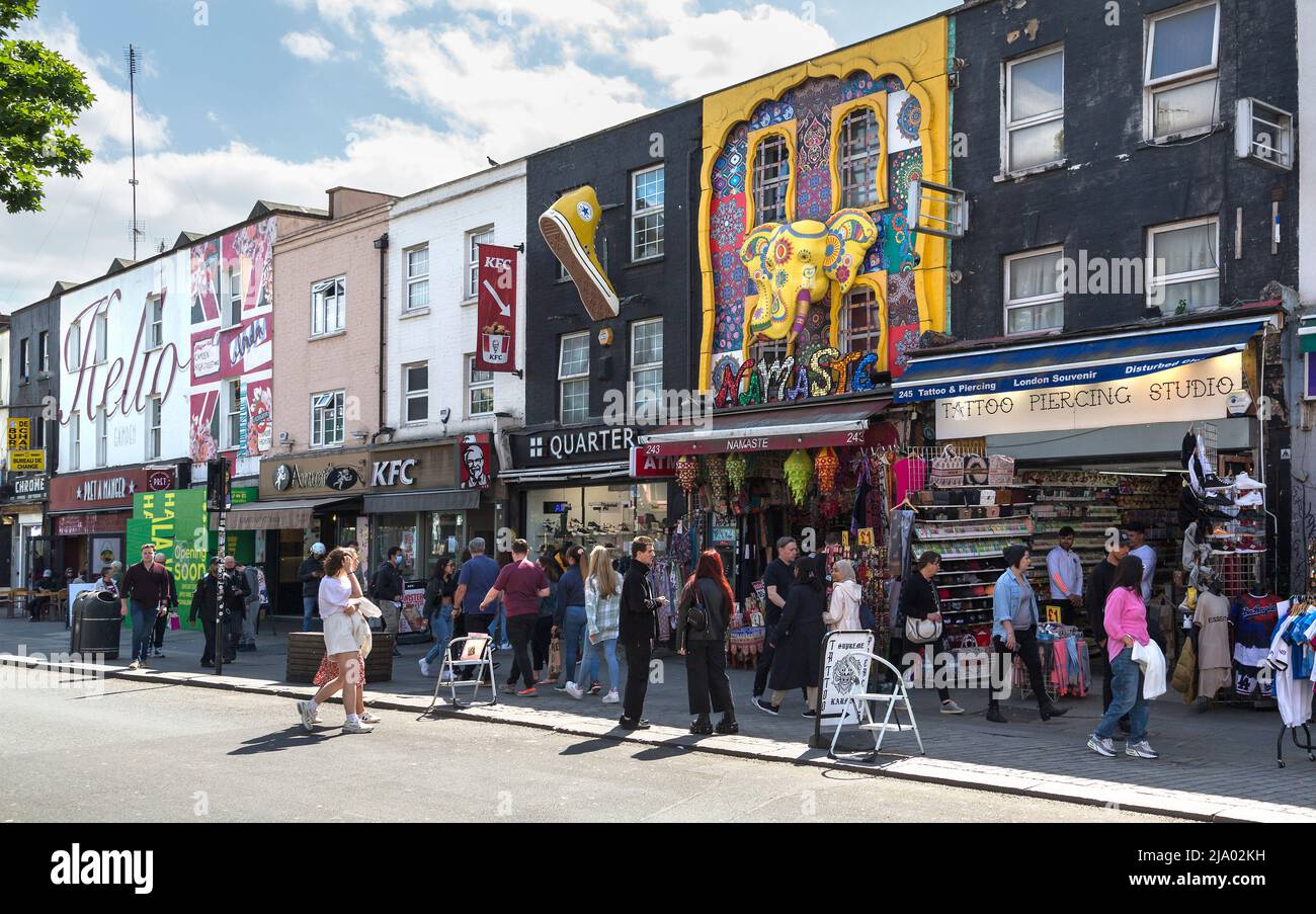 Shoppers and tourists walking along Camden High Street with it's quirky ...
