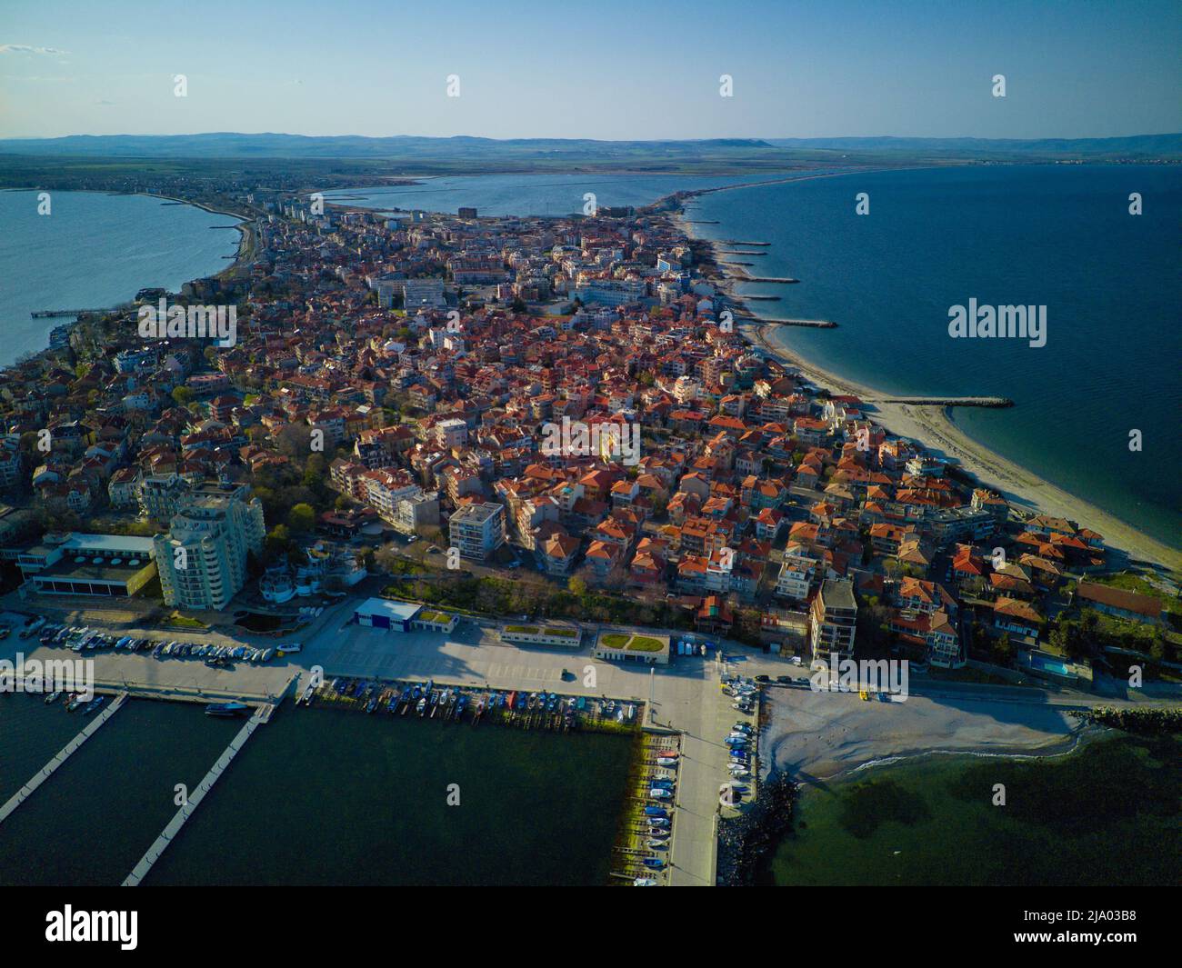 Bird's eye view over small ancient resort town of Pomorie with old ...