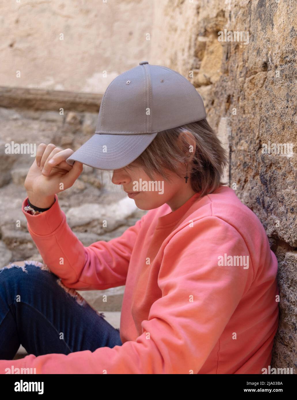 Girl teenager in a baseball cap hi-res stock photography and images - Alamy