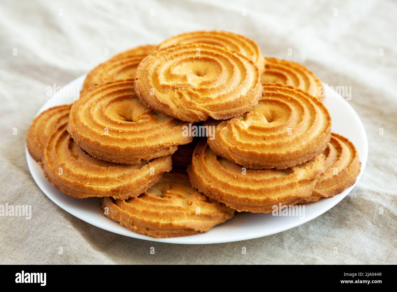 Homemade Sprits Biscuits on a Plate, side view. Close-up Stock Photo ...
