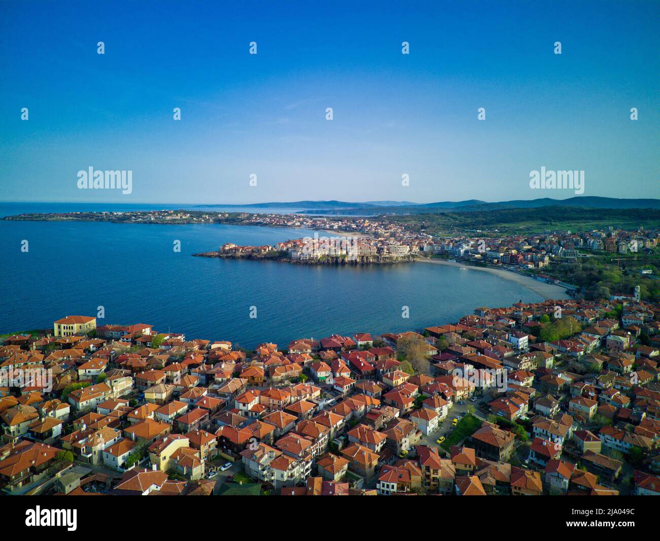 Bird's eye view over small ancient resort town of Pomorie with old ...