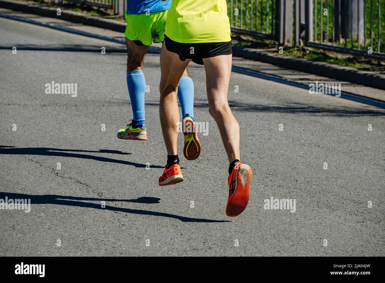 Legs two running people hi-res stock photography and images - Alamy