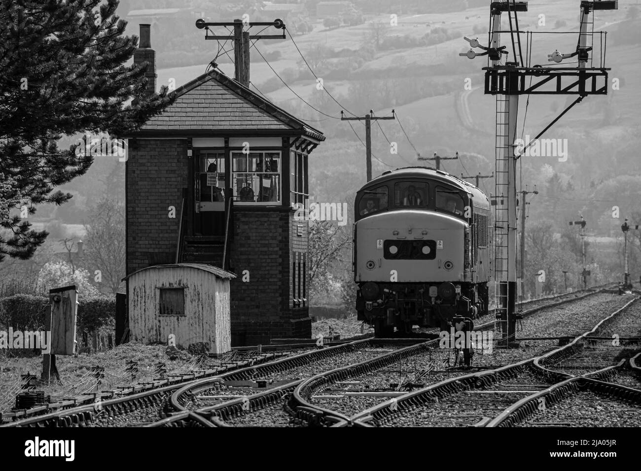 45149 Diesel Electric Locomotive Approaching Signal Box Stock Photo - Alamy