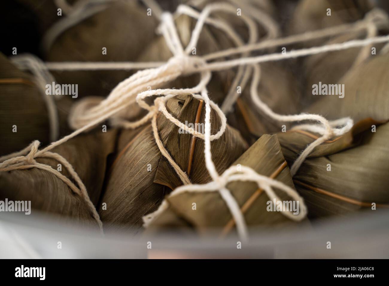 Cooking zongzi food - preparing and steaming Chinese rice dumpling at ...