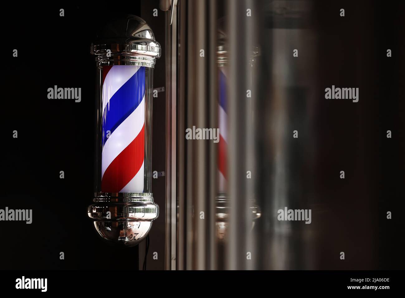 Barber shop vintage pole. copyspace Barbershop. Barber shop pole in red ...