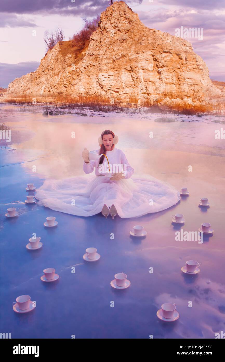 Beautiful woman on ice in winter Stock Photo - Alamy