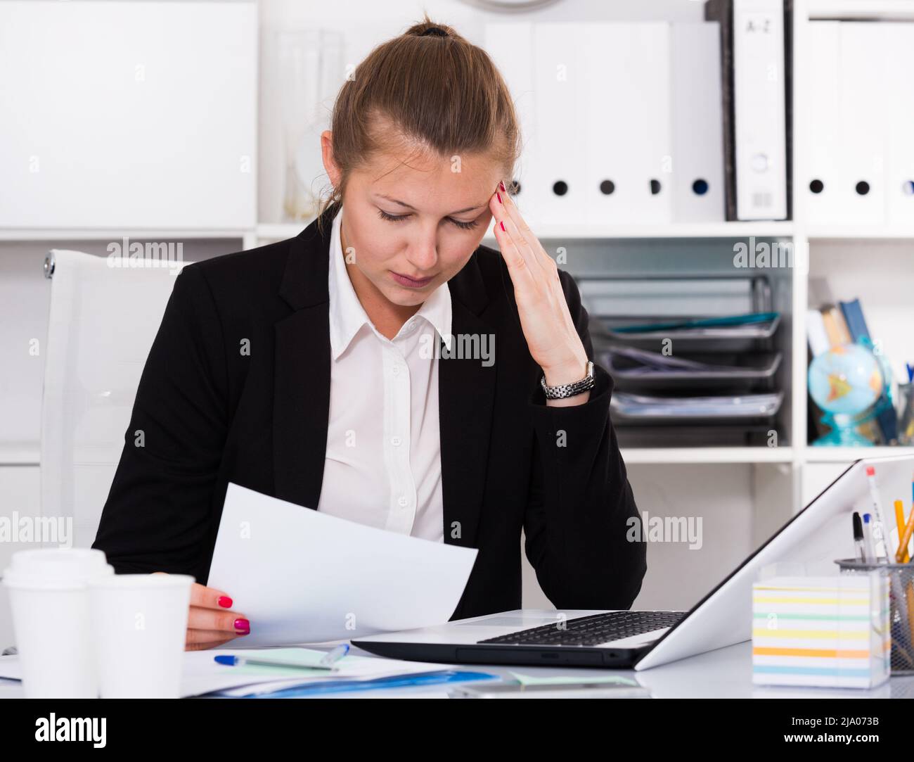 Woman in black suit is having complicated issue with project Stock ...