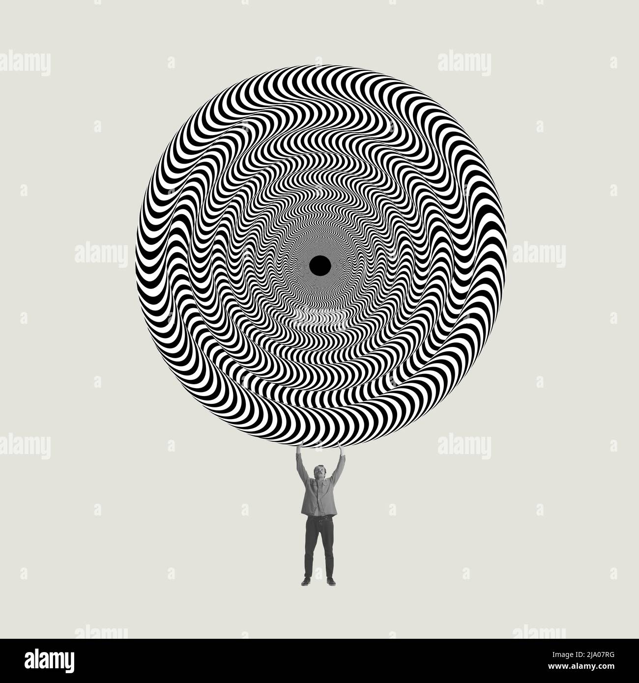 Strong man raising huge circle with pattern of optical illusion over ...
