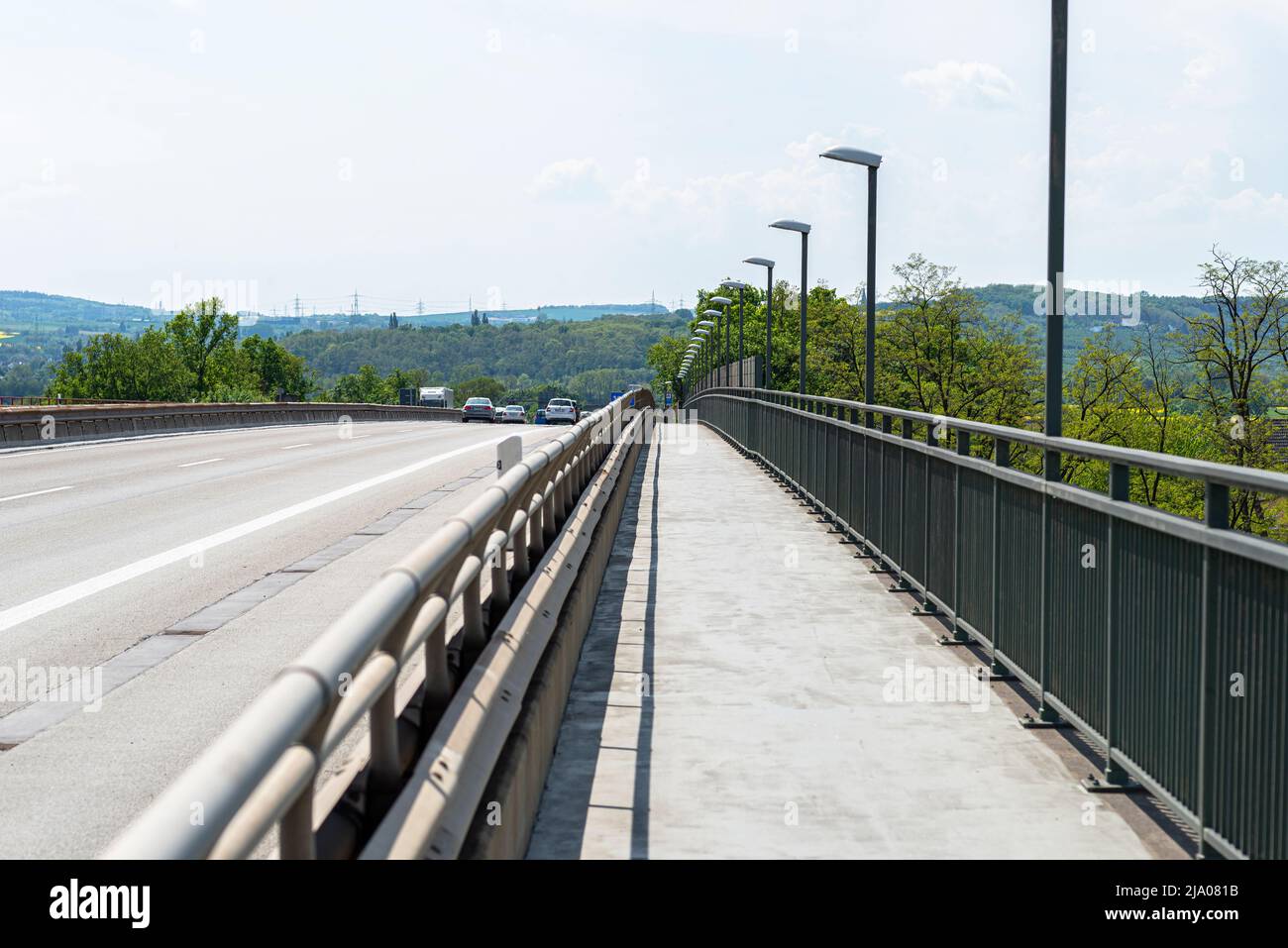 Pedestrian crossing on the highway bridge over the river in West ...
