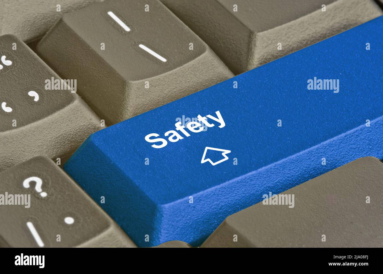 Keyboard with key for safety Stock Photo - Alamy