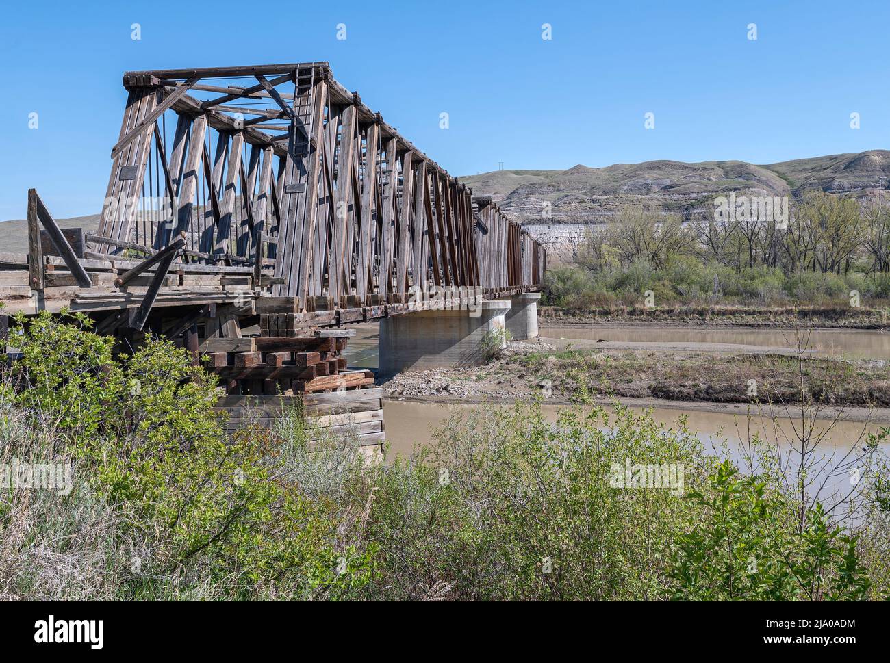 Historic Howe truss train bridge crossing the Red Deer River near ...
